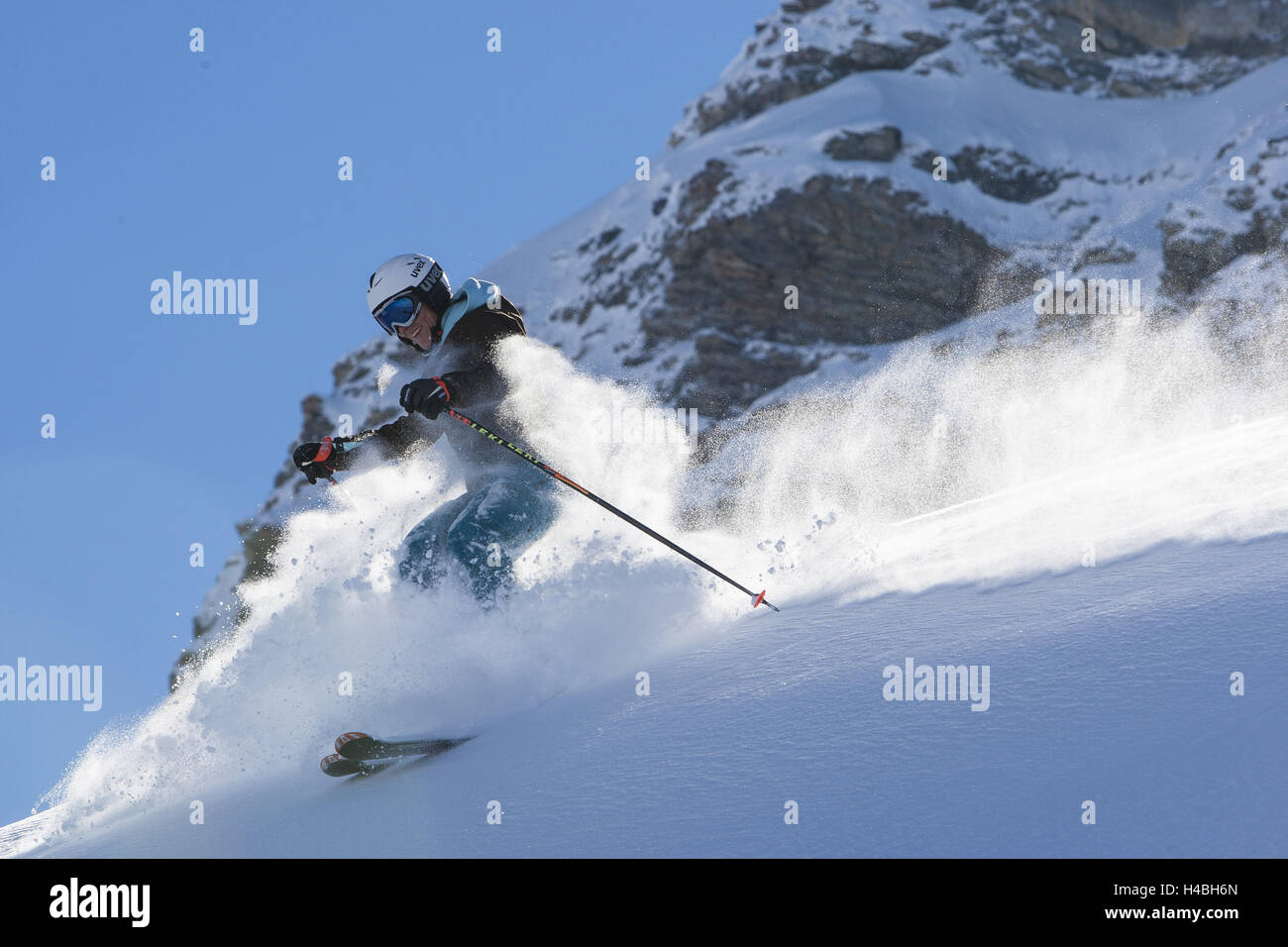 Skier on deep snow hi-res stock photography and images - Alamy