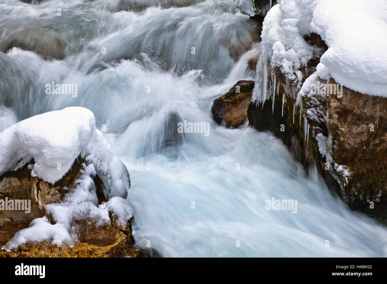 Icy mountain brook Stock Photo - Alamy