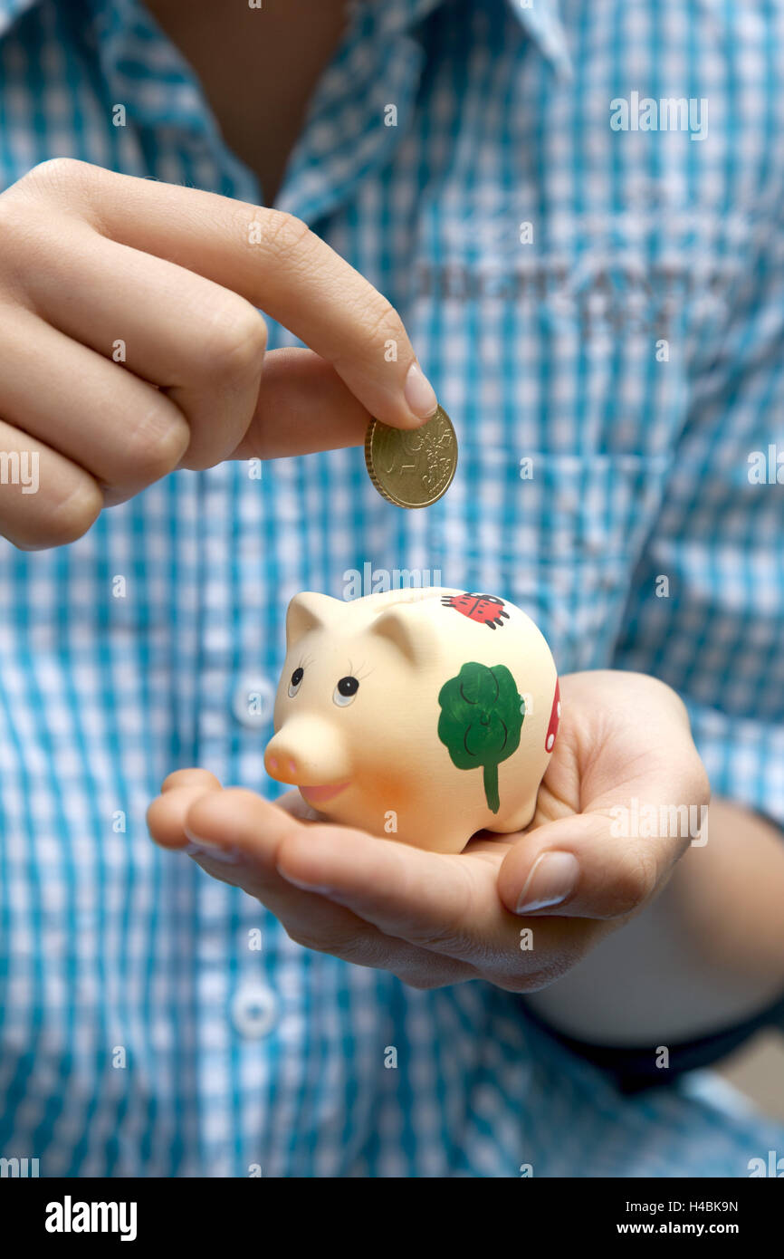 Woman, young, piggy bank, hand Stock Photo - Alamy