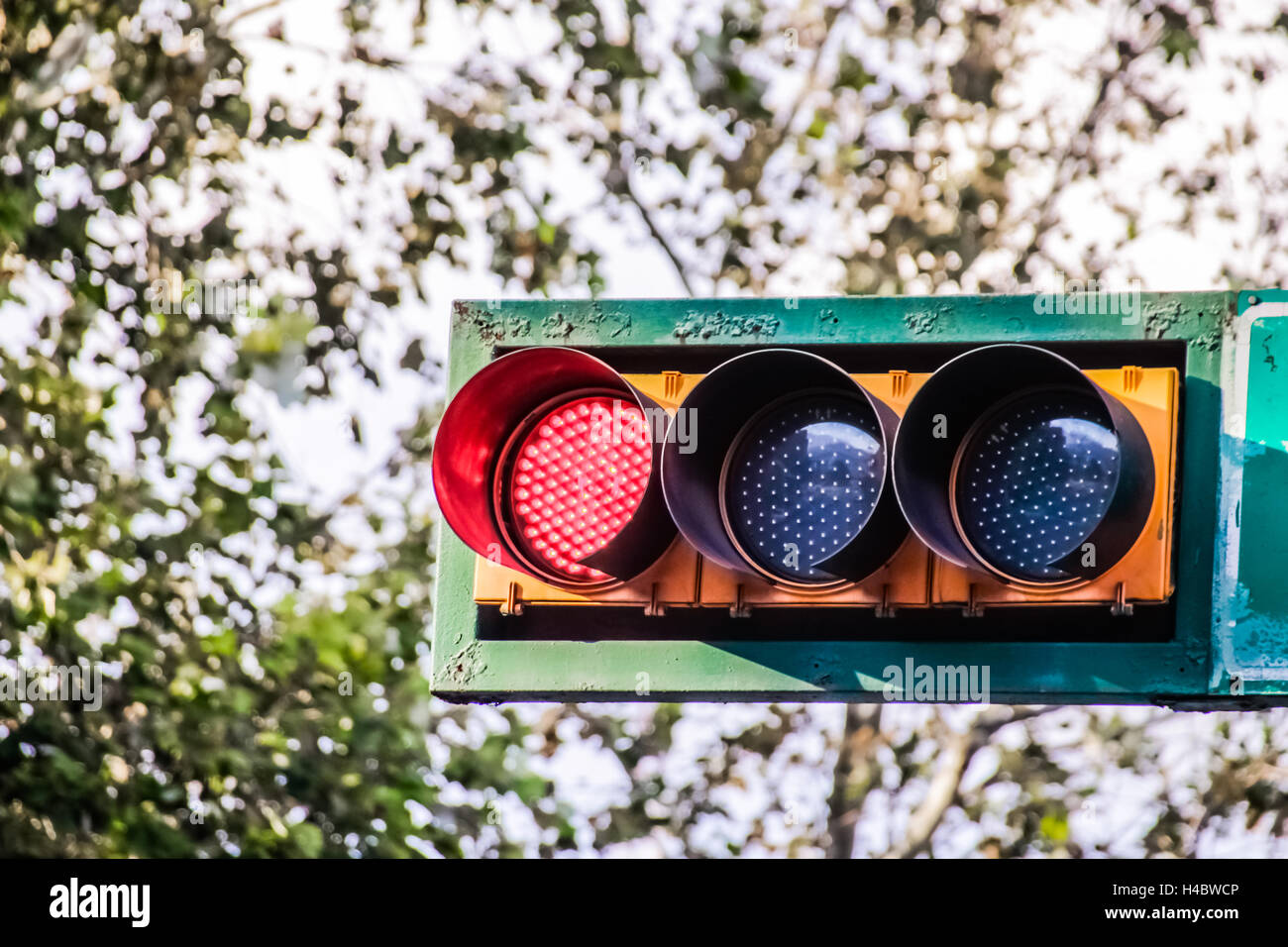 Photograph of a traffic light on urban scenario Stock Photo - Alamy