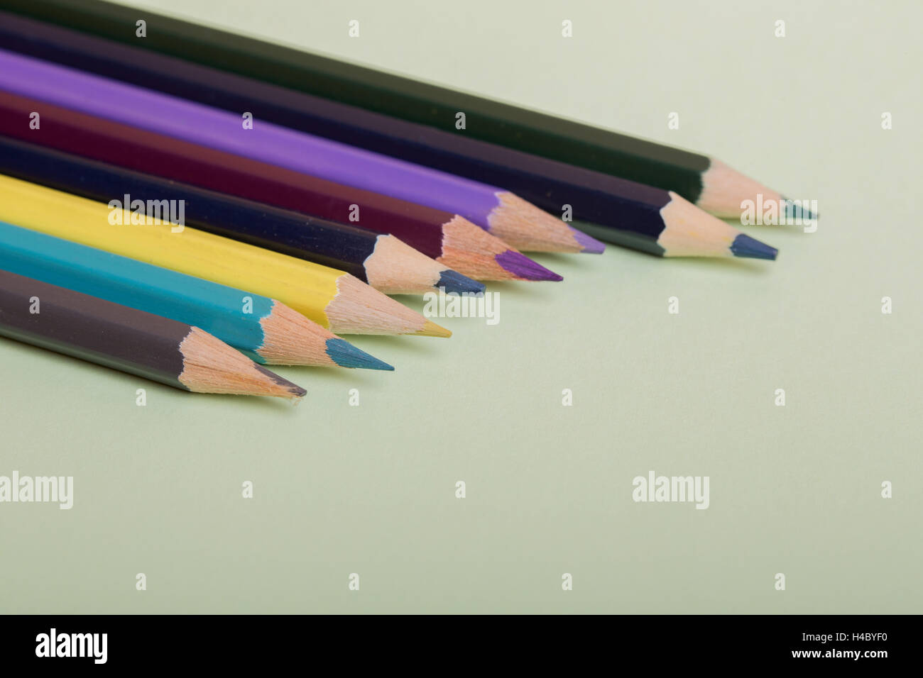 Wooden colorful pencils, on a grey paper Stock Photo - Alamy
