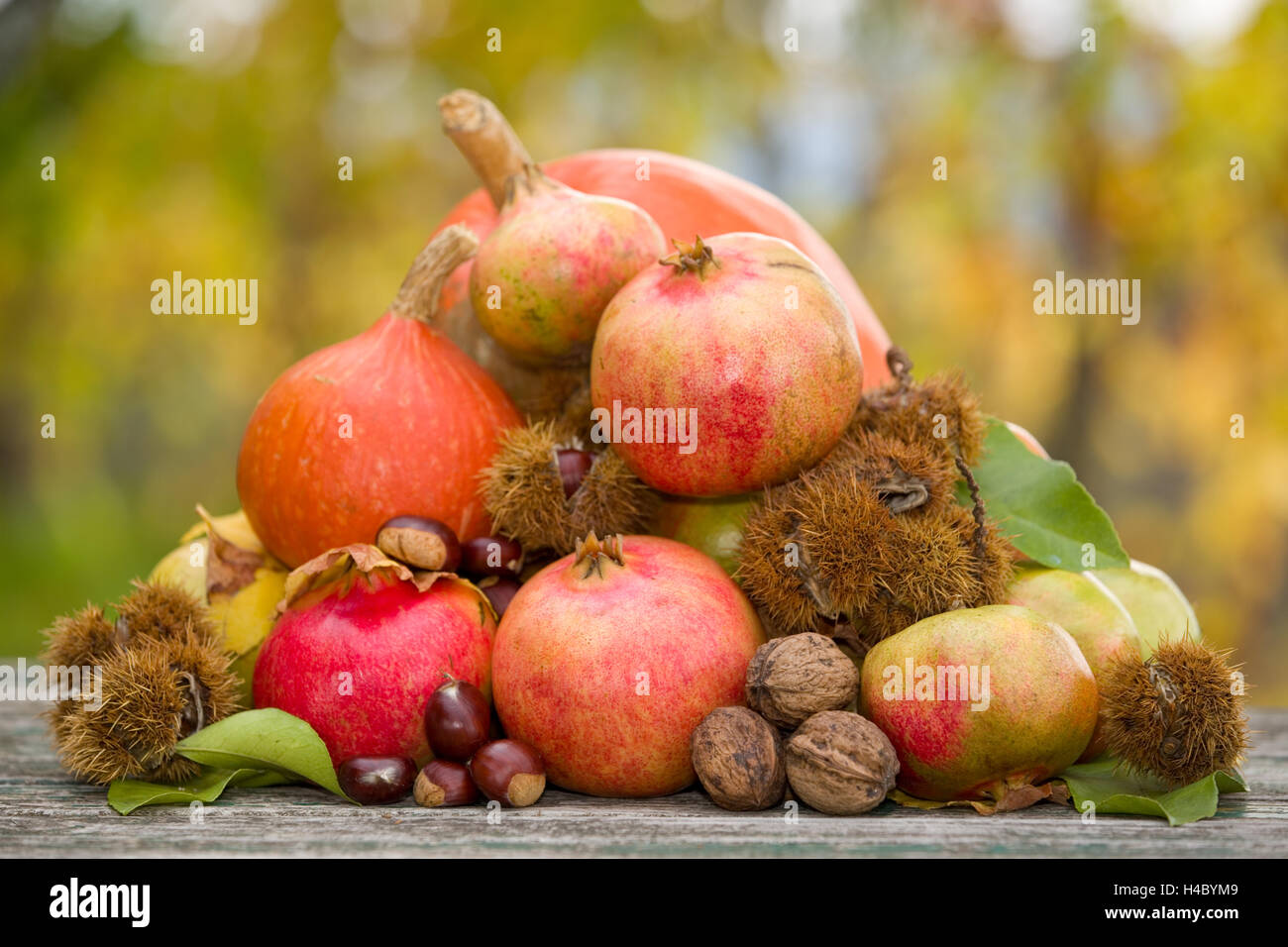 Fresh autumn fruits,on a wooden table Stock Photo - Alamy