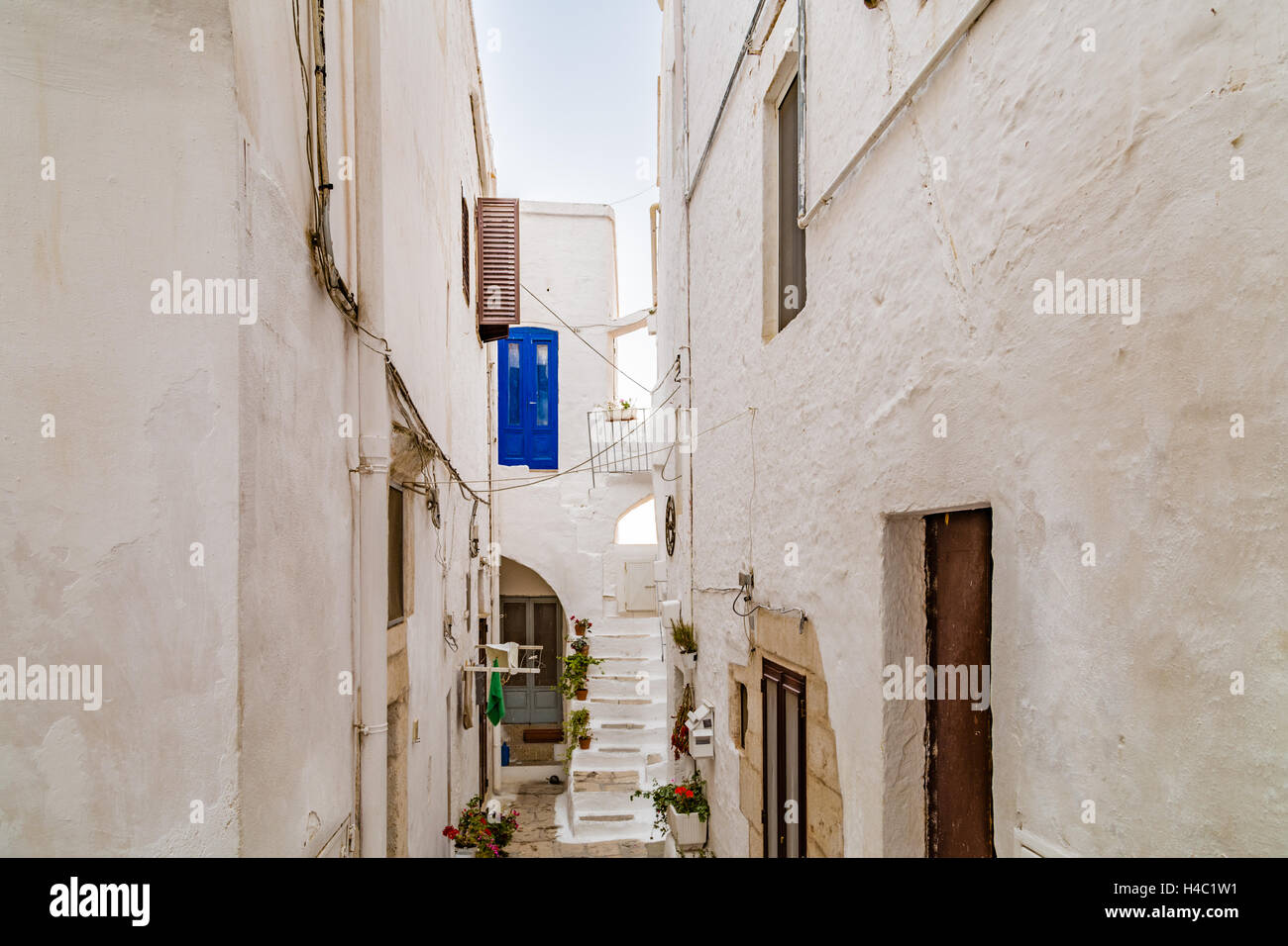 Narrow street of Ostuni, The White City Stock Photo - Alamy