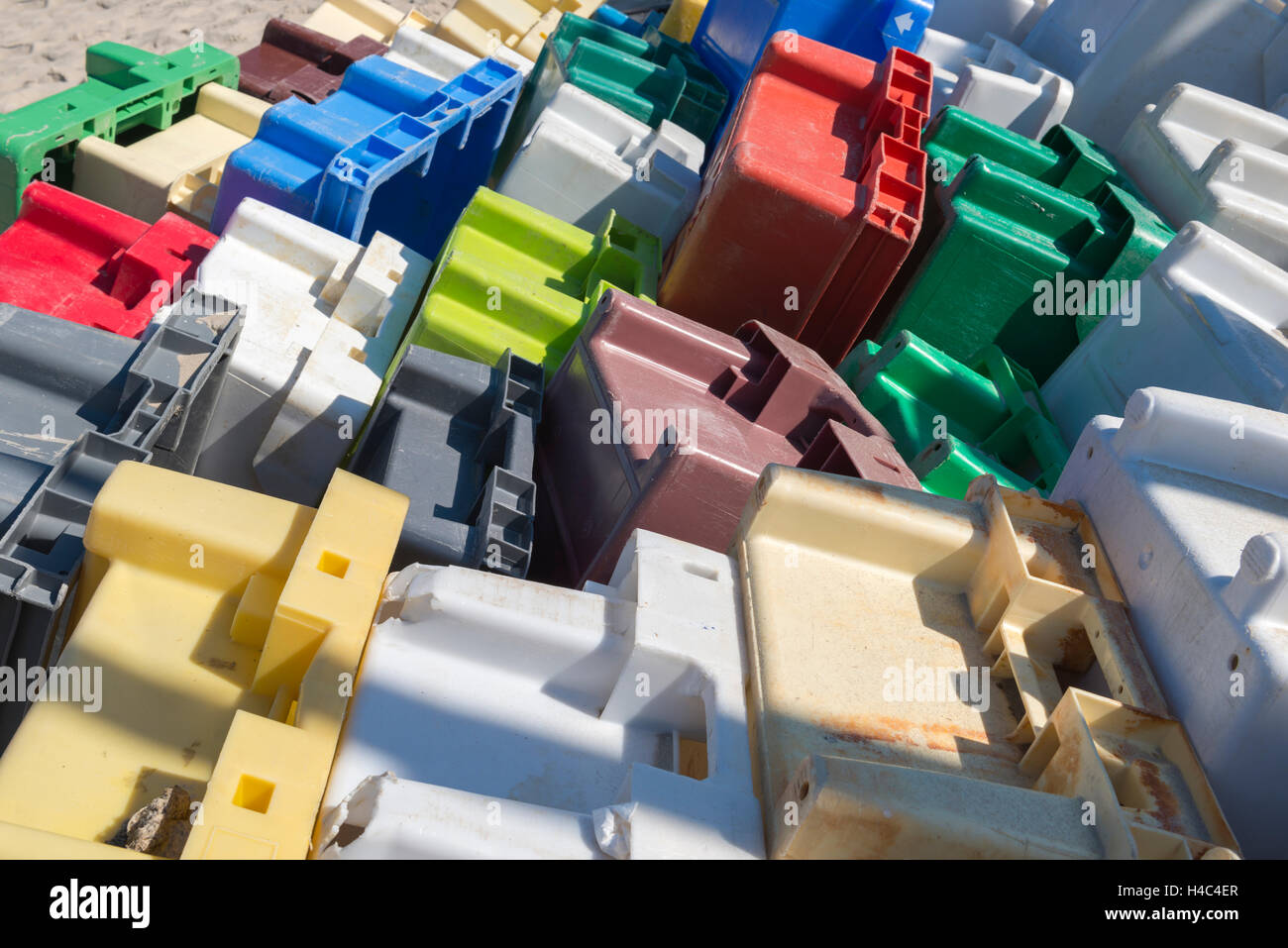 Colourful collection of old exhibited plastic crates Stock Photo - Alamy
