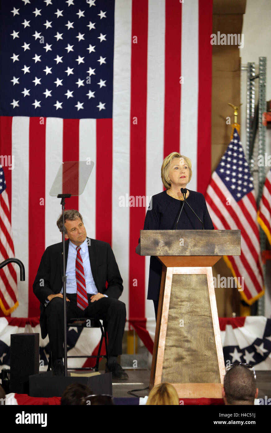 Hillary Clinton speaking at a rally at Team Wendy Cleveland Industrial ...