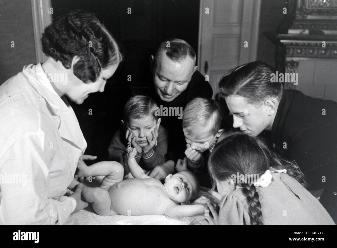 Hitler listening hi-res stock photography and images - Alamy