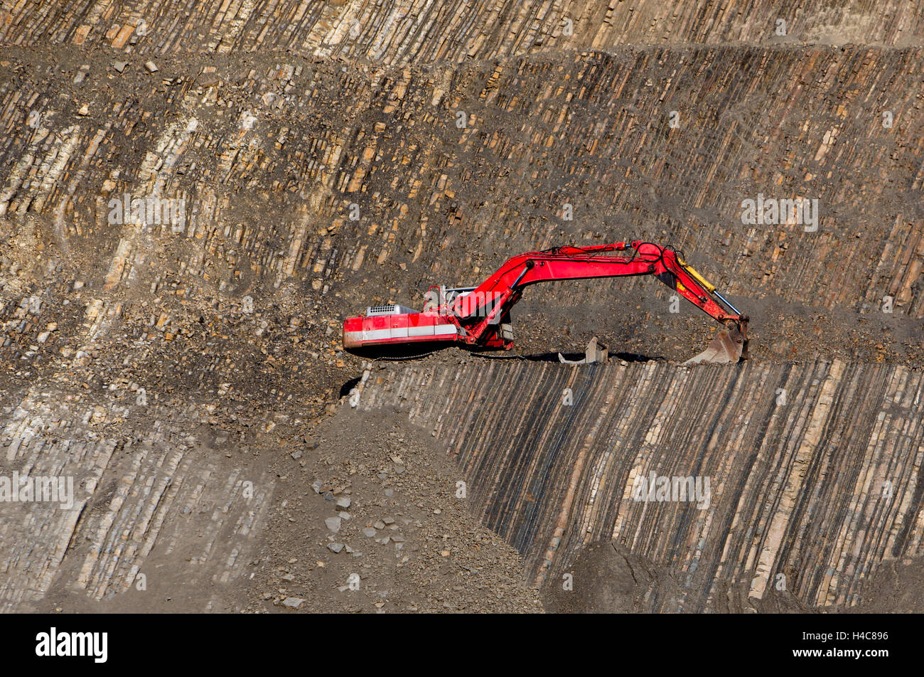 Red digger in stone-pit Stock Photo - Alamy