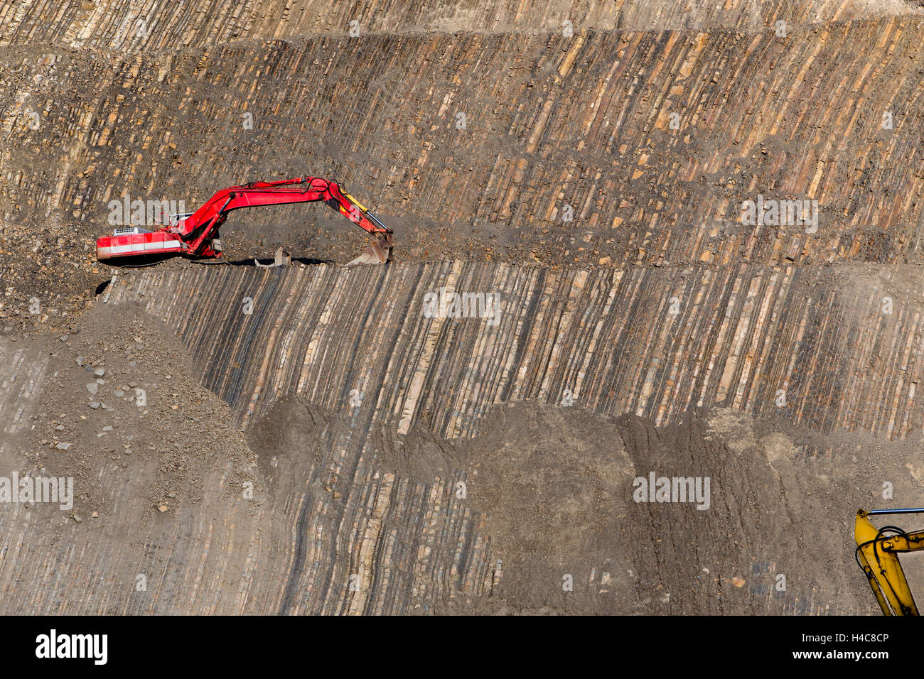 Red digger in stone-pit Stock Photo - Alamy
