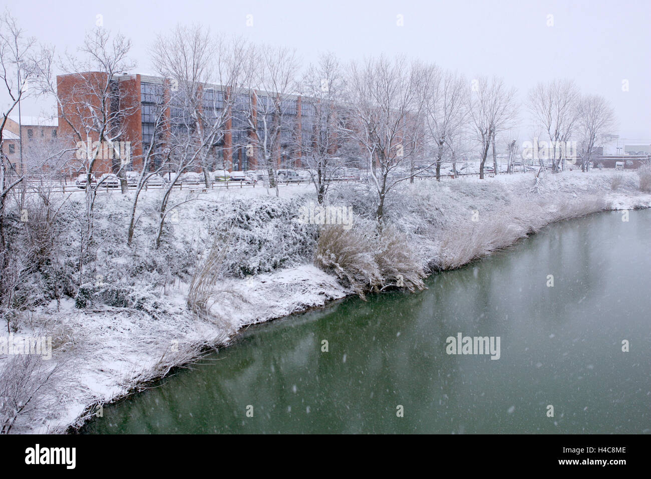 Cecina, Livorno, Tuscany - snowfall in the city, the bridge on the ...