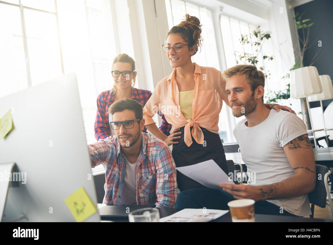 Manager colleague working on project hi-res stock photography and ...