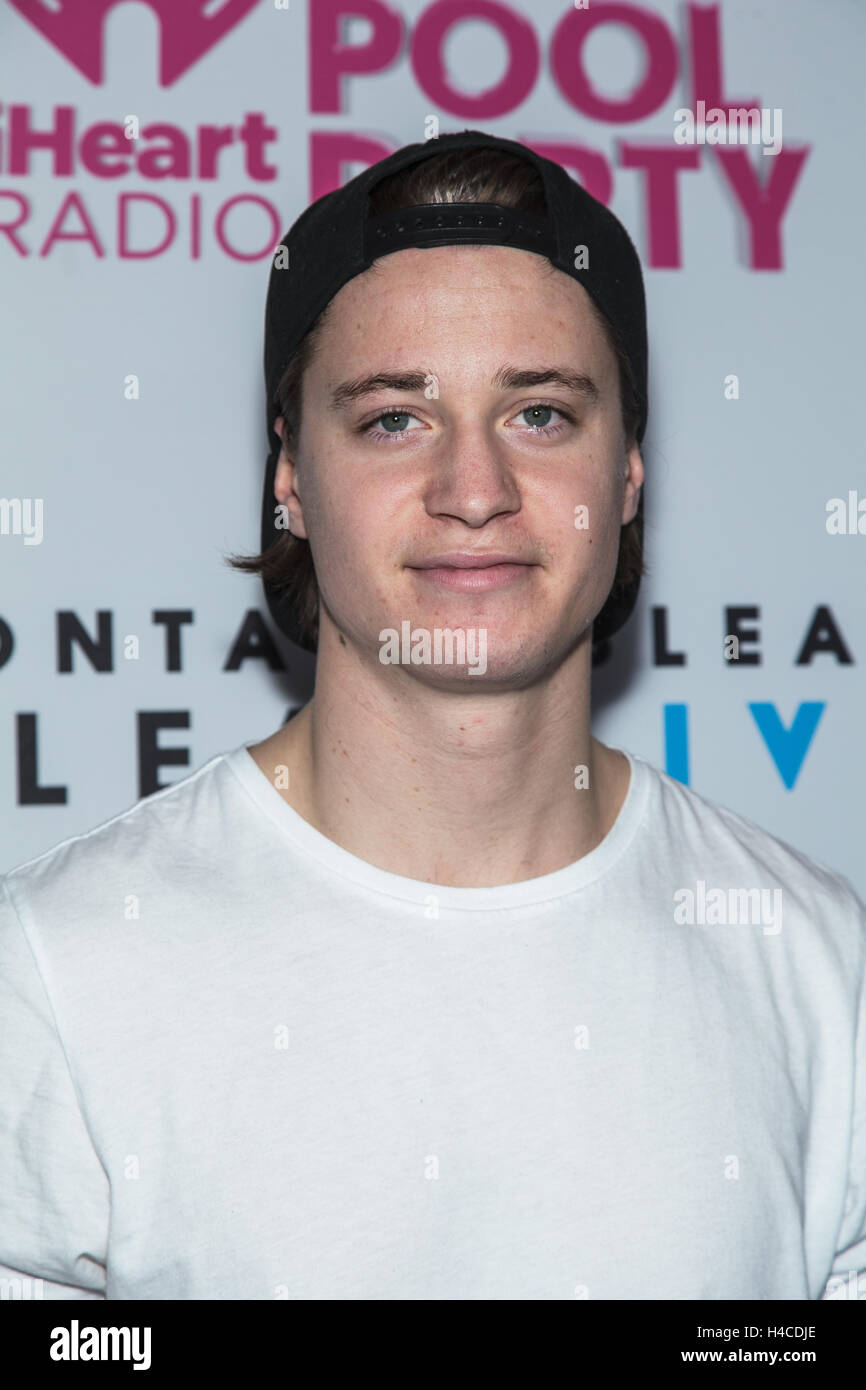 Kygo arrives on the blue carpet at the iHeart Radio Summer Pool Party ...