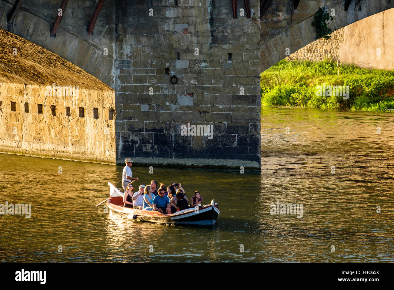 Boat under the bridge Stock Photo - Alamy