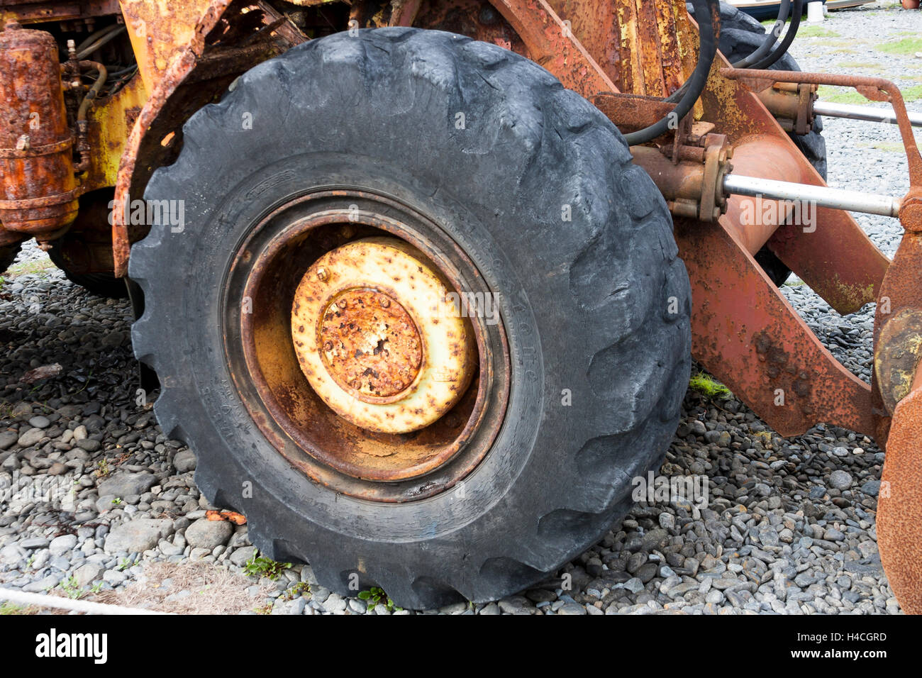 Rusty digger wheel Stock Photo - Alamy