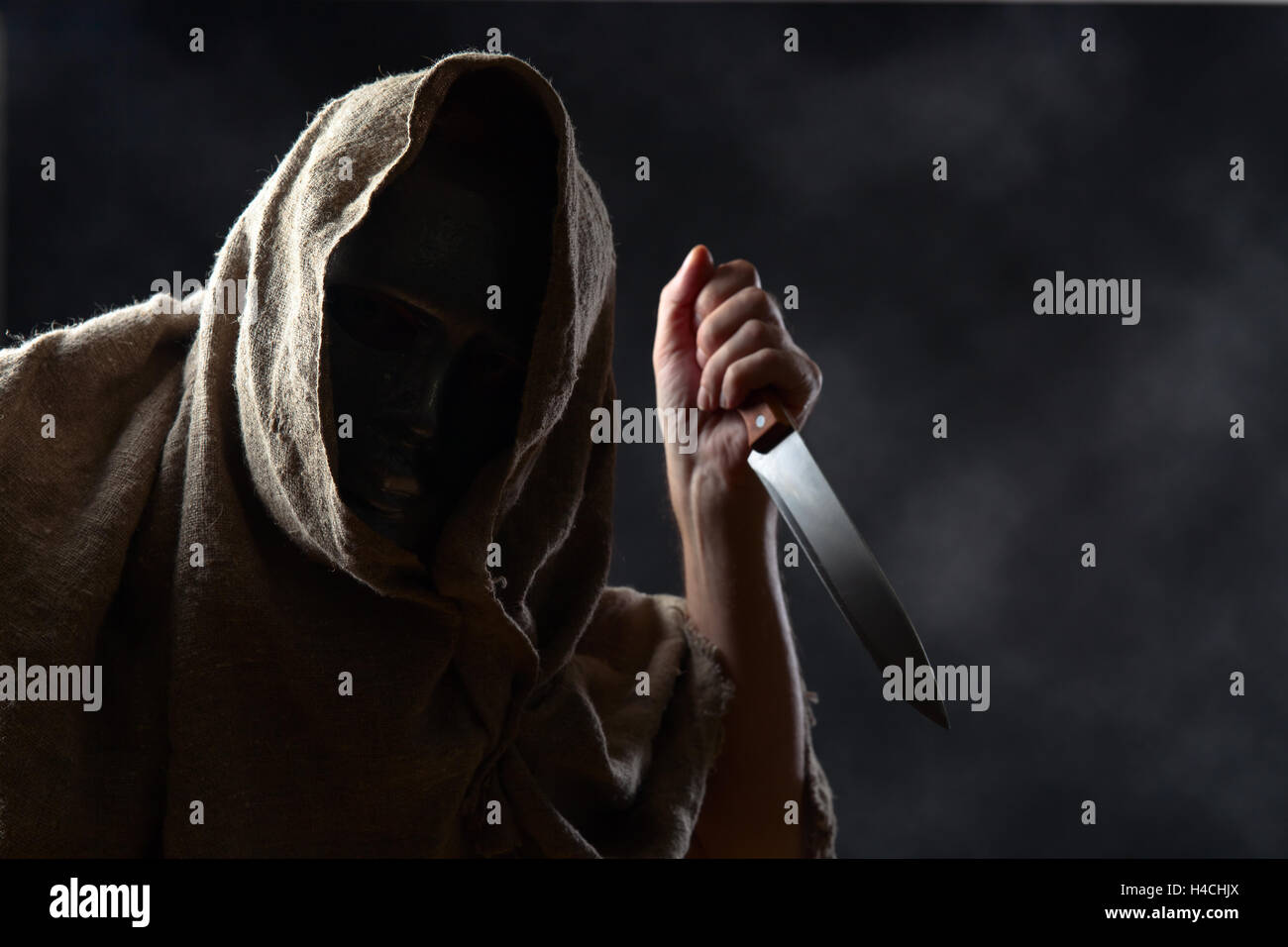 Man in terrible face mask hi-res stock photography and images - Alamy