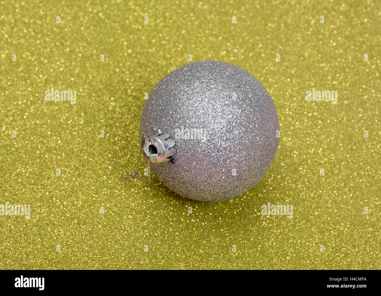 Silver Christmas ball on Glitter Background Stock Photo - Alamy