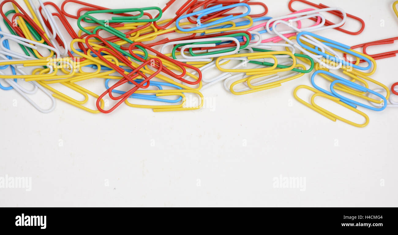 Colorful Paper Pins on white background Stock Photo - Alamy