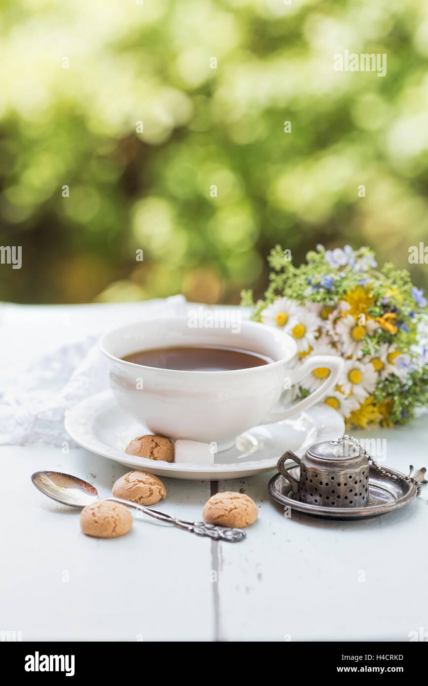 Still life, tea set, wooden table, outside, tea egg, silver spoon ...