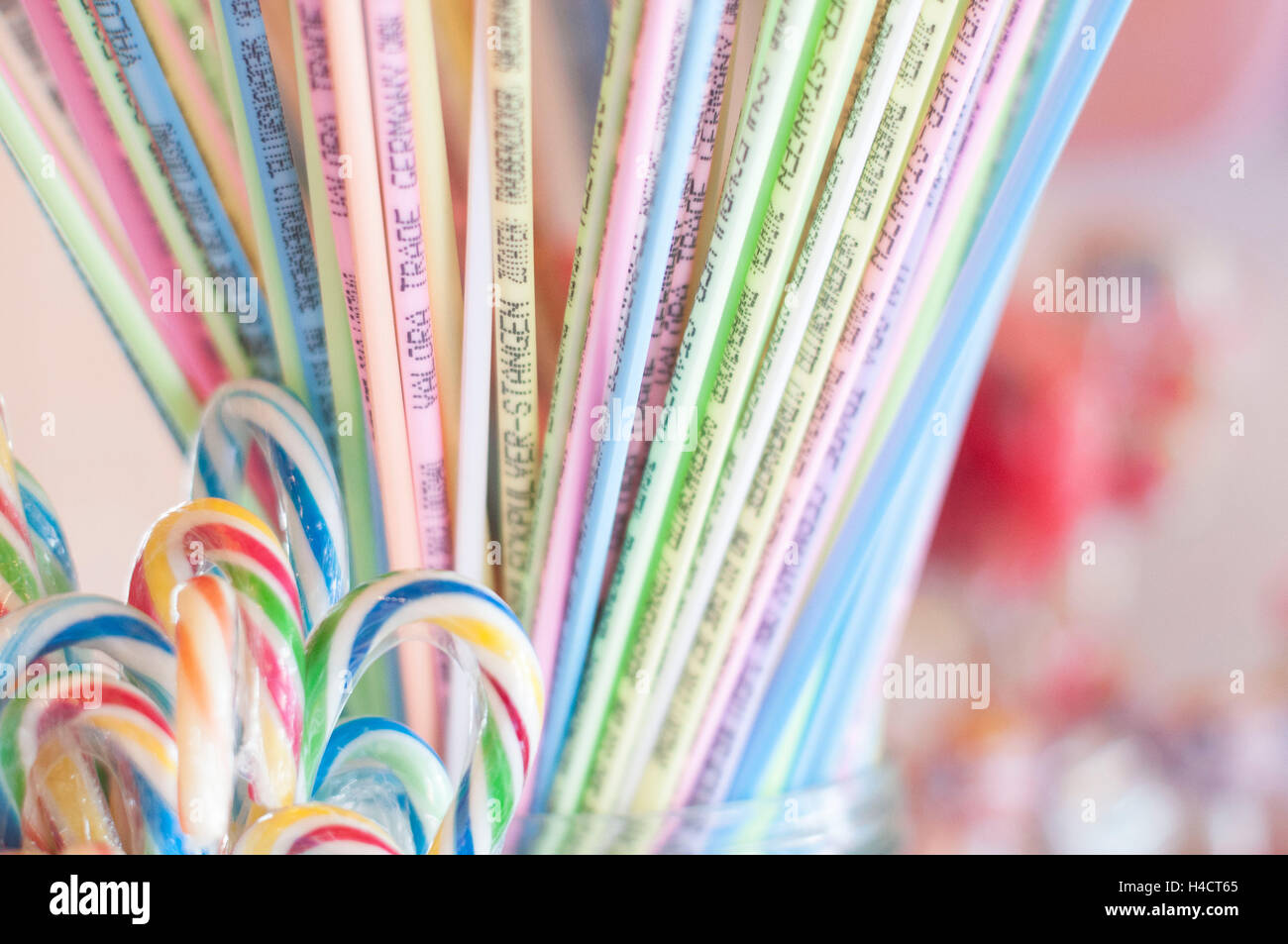 Sticks of sugar and sherbet powder in the glass Stock Photo - Alamy