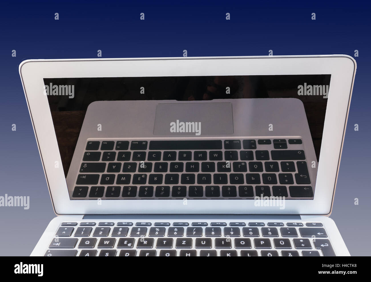 reflection of keyboard in isolated laptop monitor Stock Photo - Alamy