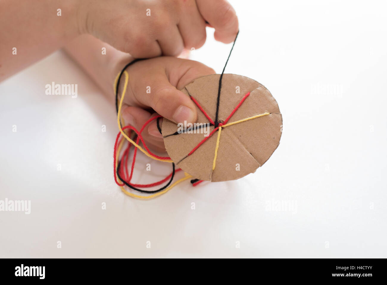 Easily: Bracelets wool do handicraft Stock Photo - Alamy