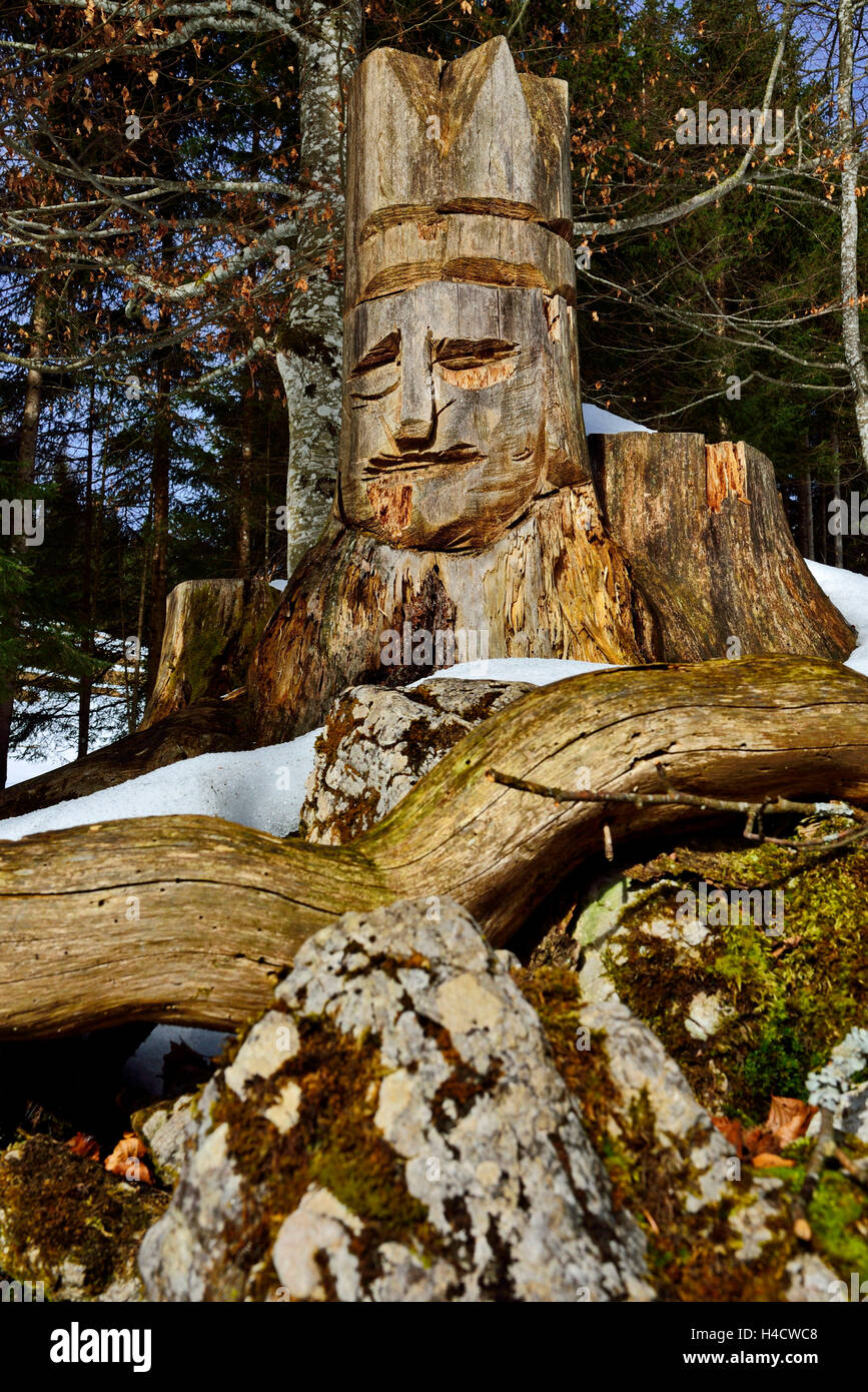 With of a chain saw carved figure from of a trunk in the wood Stock ...