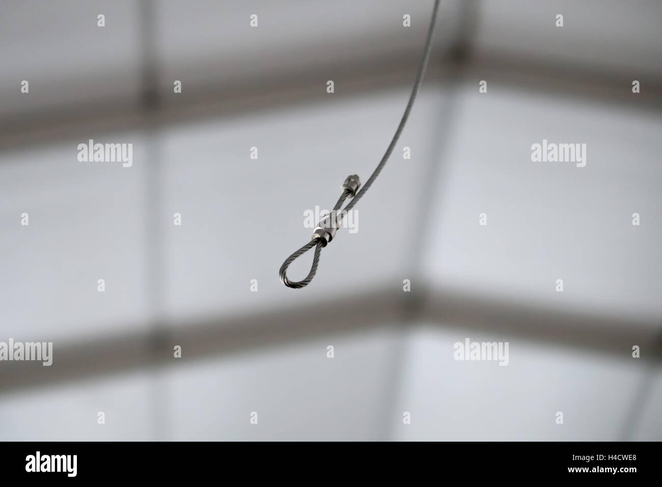 Cables and hook hanging from the Ceiling at the Construction site Stock ...