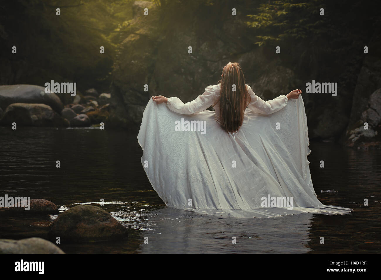 Ethereal woman listening the river music. Surreal and romantic Stock ...