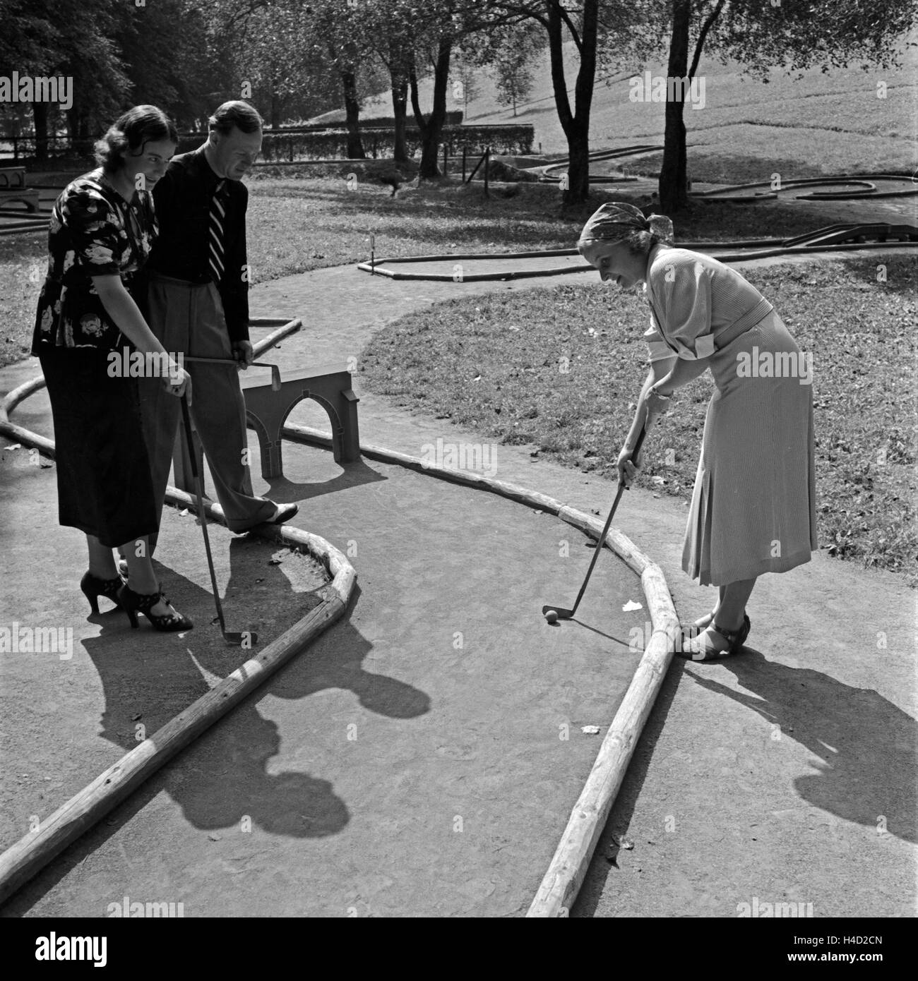 Minigolf competition Black and White Stock Photos & Images - Alamy