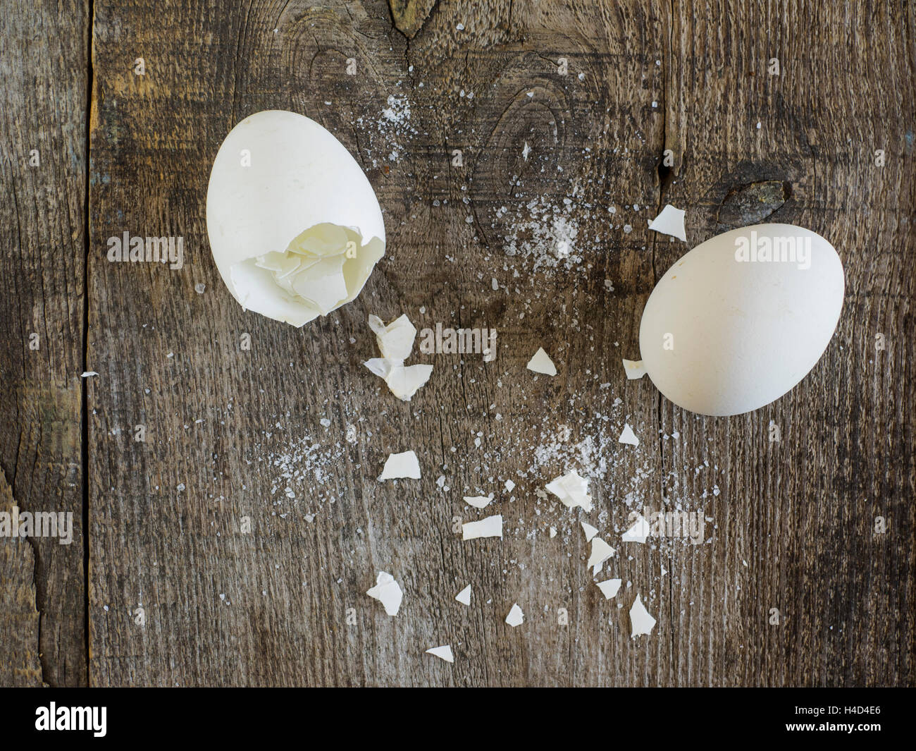 boiled egg and egg shells from eaten boiled eggs on old wooden ...