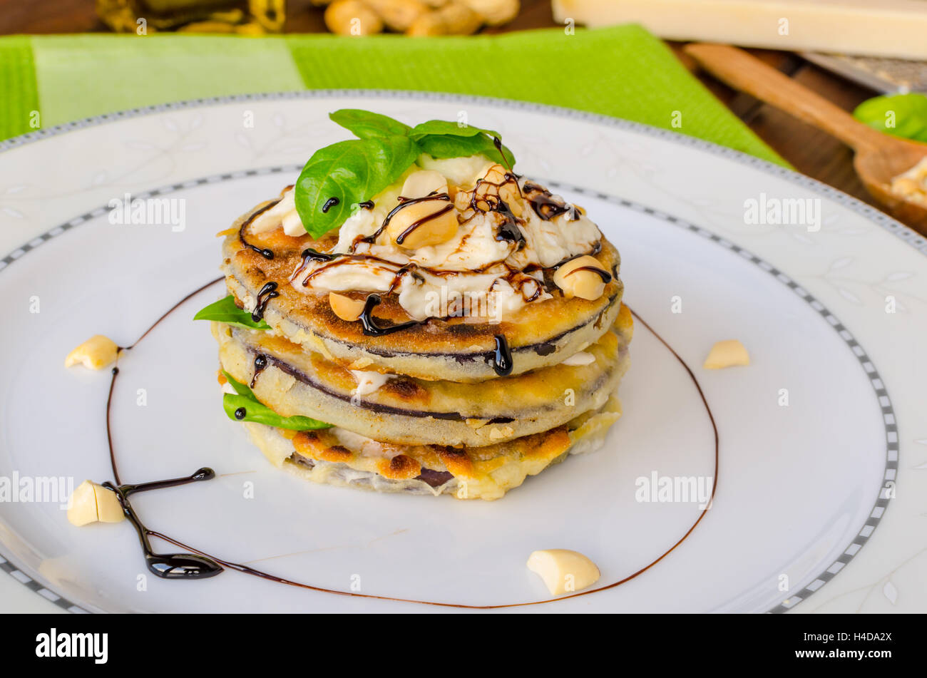 Grilled eggplant with feta cheese, parmesan, basil, nuts and balsamic ...