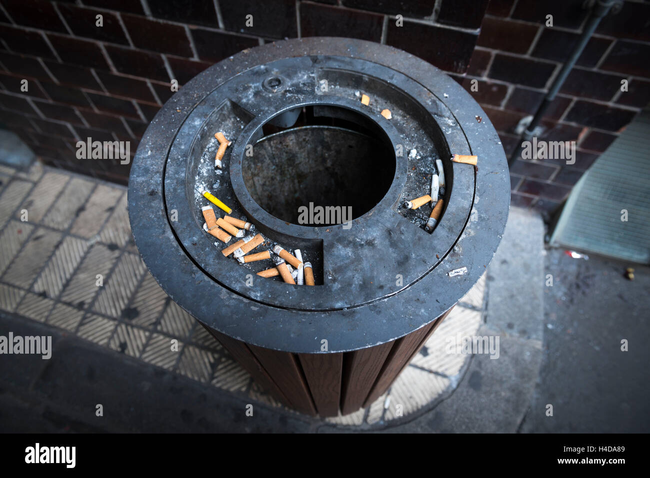 Ashtray on a public space Stock Photo - Alamy