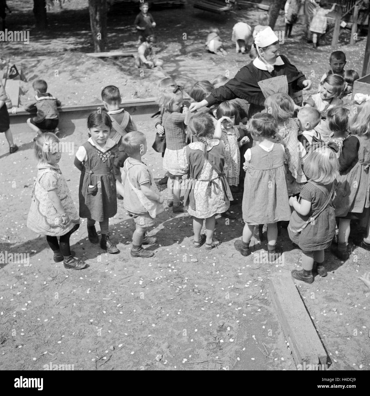 1930s children playground hi-res stock photography and images - Alamy