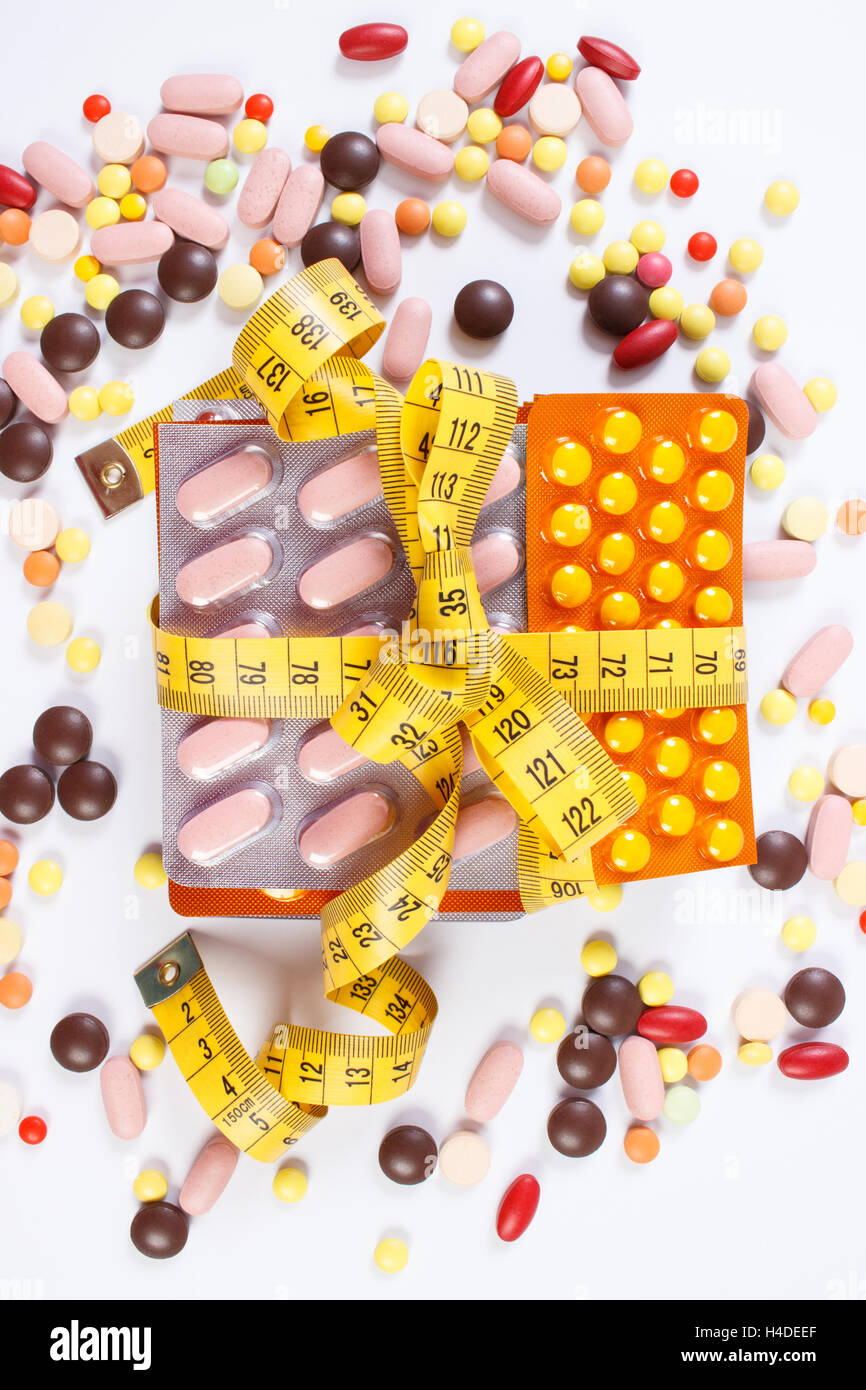 Blisters of medical pills, tablets, capsules or supplements wrapped ...