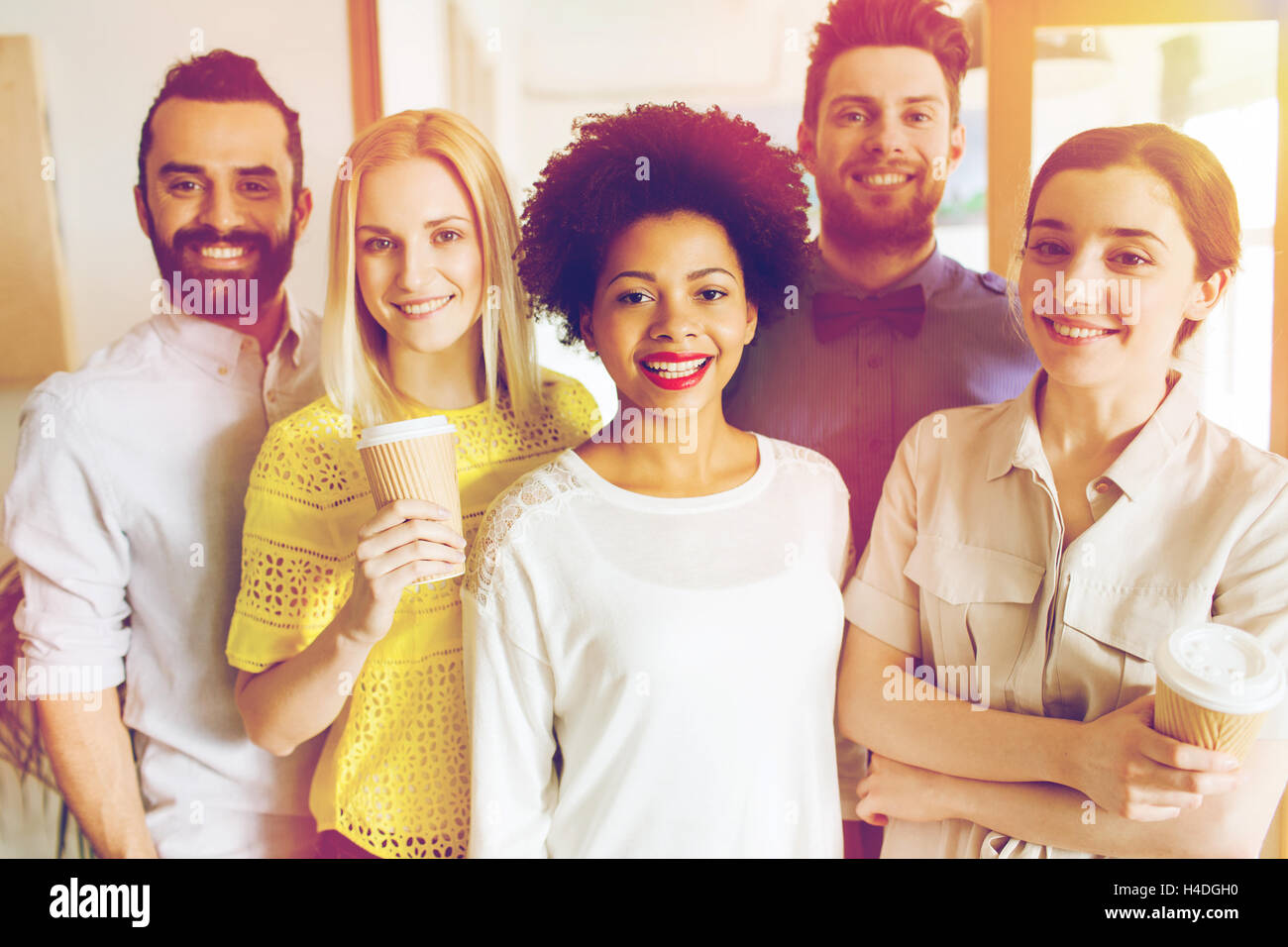 happy creative team in office Stock Photo - Alamy