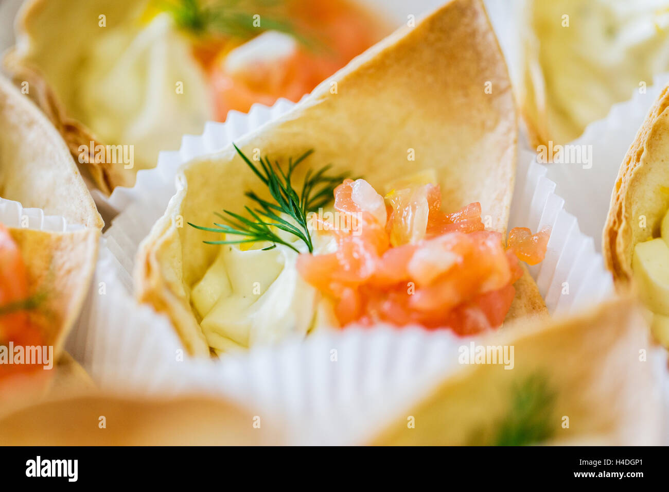 close up of dough cornet with salmon fish filling Stock Photo - Alamy