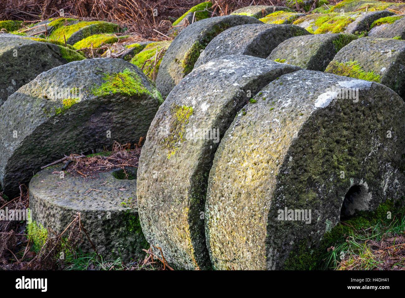 Hathersage. Carved, chiselled round, abandoned mill wheel, old, rural ...