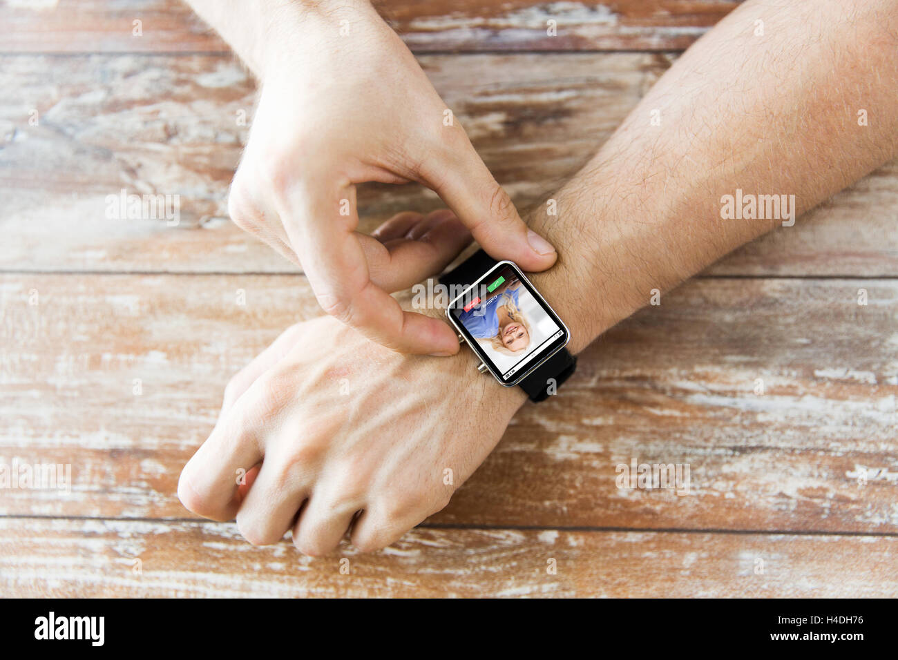 close up of hands with incoming call on smartwatch Stock Photo - Alamy