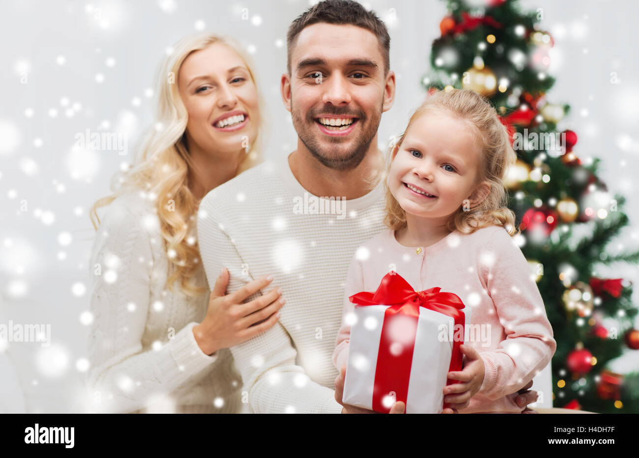 happy family at home with christmas gift box Stock Photo - Alamy