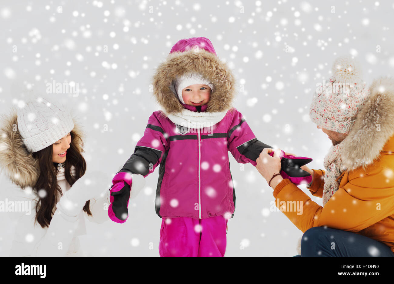 happy family with child in winter clothes outdoors Stock Photo - Alamy