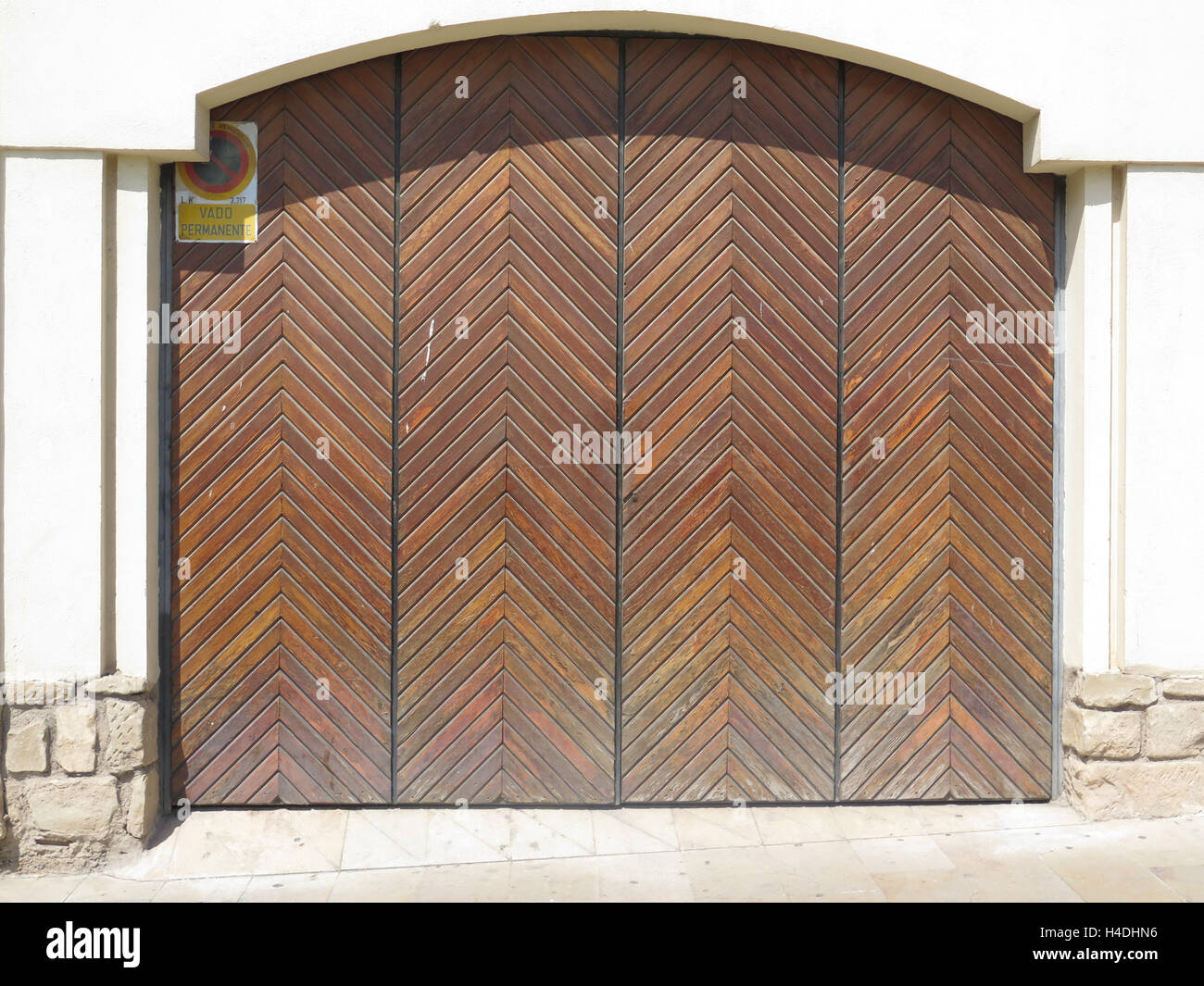 Varnished Ornate carved Garage Door in Jaen, Spain Stock Photo - Alamy