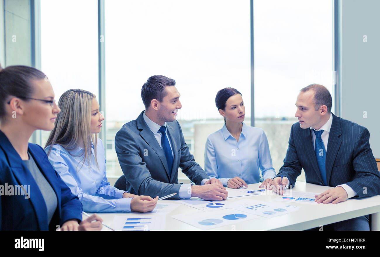 smiling business team at meeting Stock Photo - Alamy