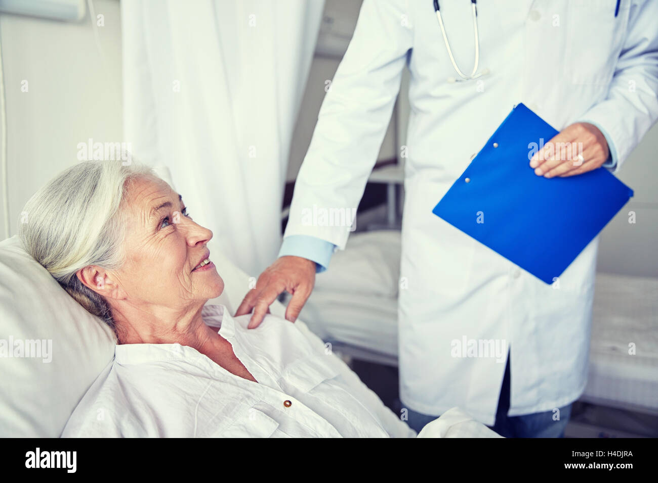Doctor senior woman happy hi-res stock photography and images - Alamy