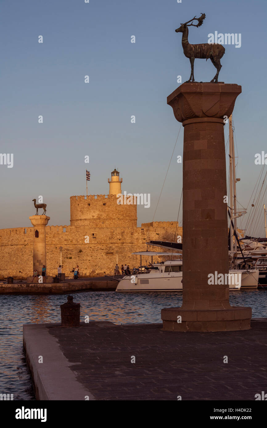 Rhodes, columns with deer with fortress "Agios Nikolaos Stock Photo - Alamy