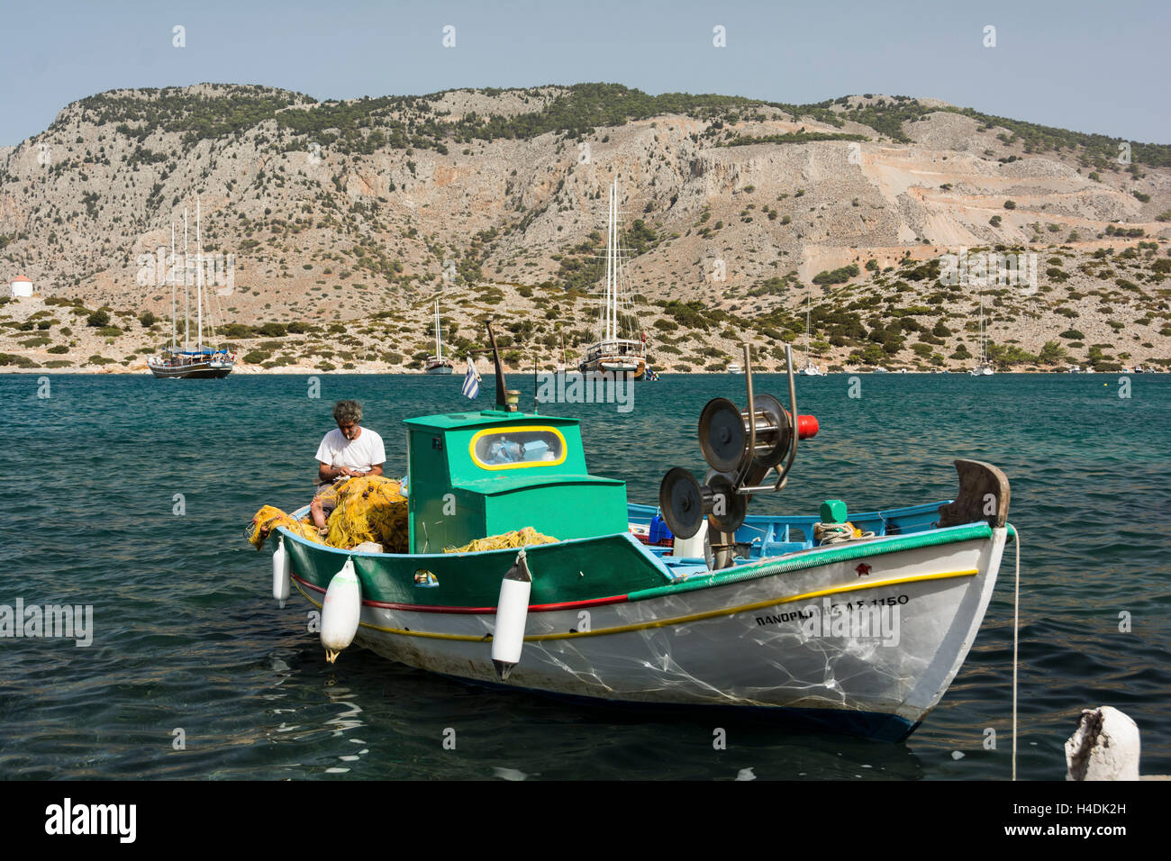 Simi, fishing boat in the harbour Moni Panormitis Stock Photo - Alamy