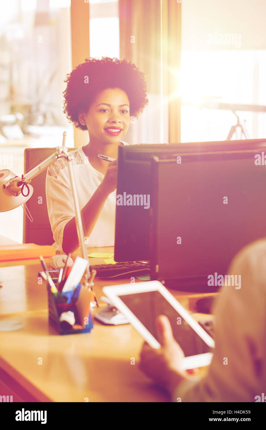 happy creative female office worker with computer Stock Photo - Alamy