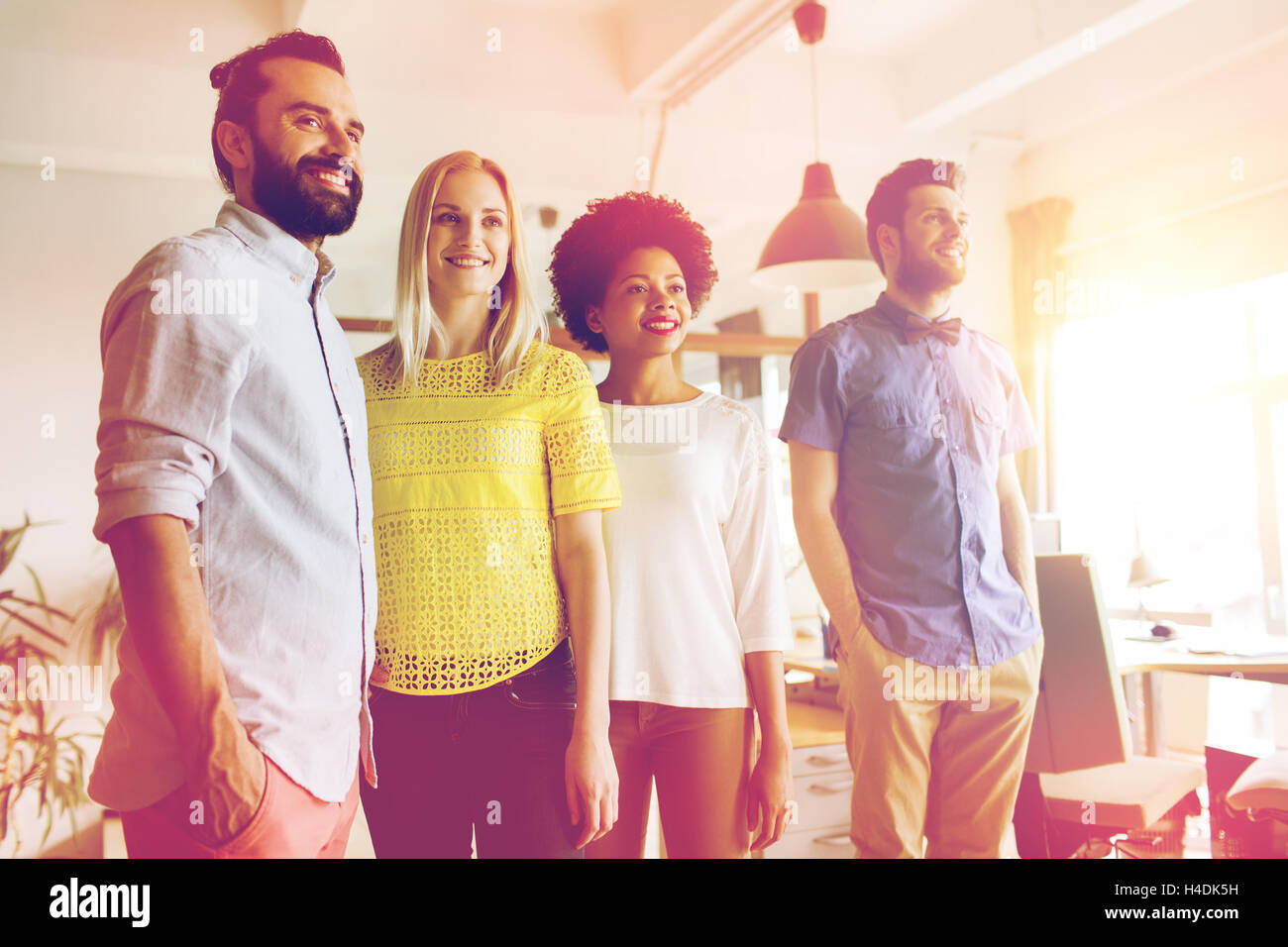 happy creative team in office Stock Photo - Alamy