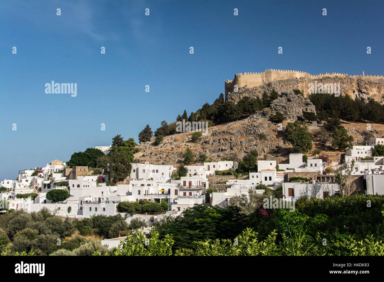 Rhodes, Lindos, local view with Acropolis Stock Photo - Alamy
