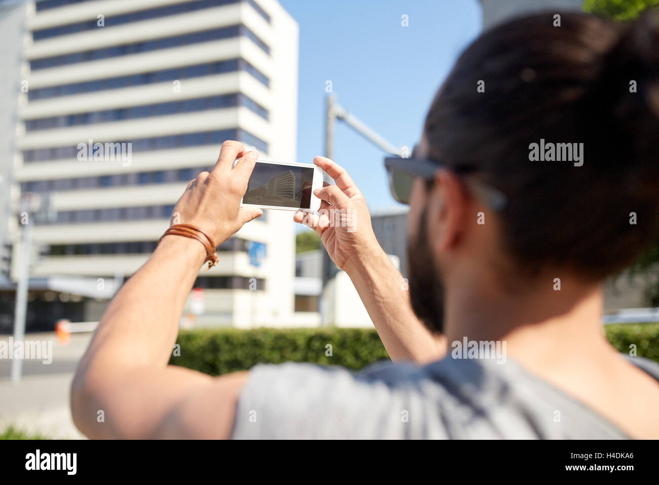 Back view of man taking picture of hi-res stock photography and images ...