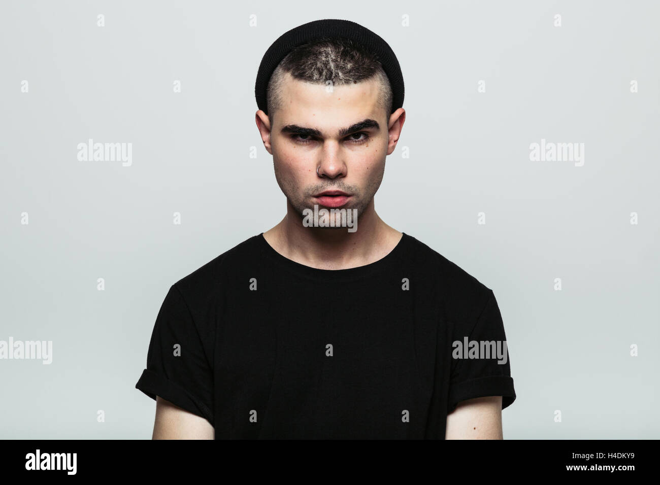 Stylish man looking camera calm hi-res stock photography and images - Alamy