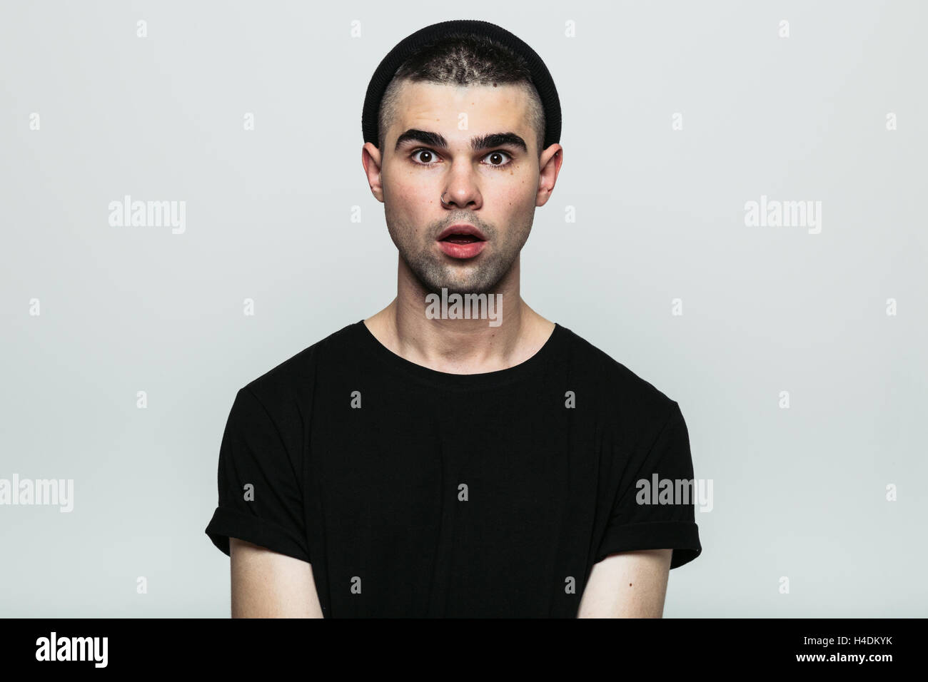 Isolated portrait of shocked man Stock Photo - Alamy